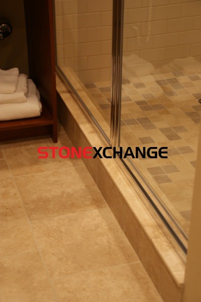 Travertine Window Sills installed as Shower Curbs | STONEXCHANGE